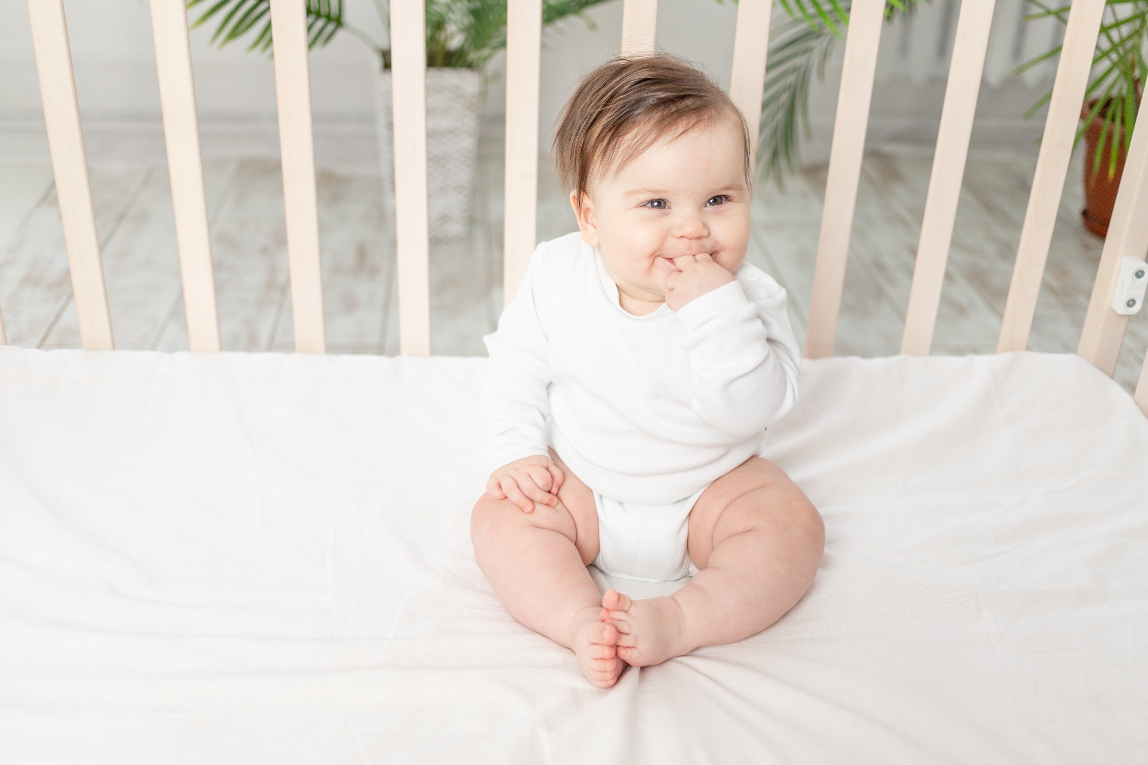 When to Lower the Crib Mattress | Taking Cara Babies
